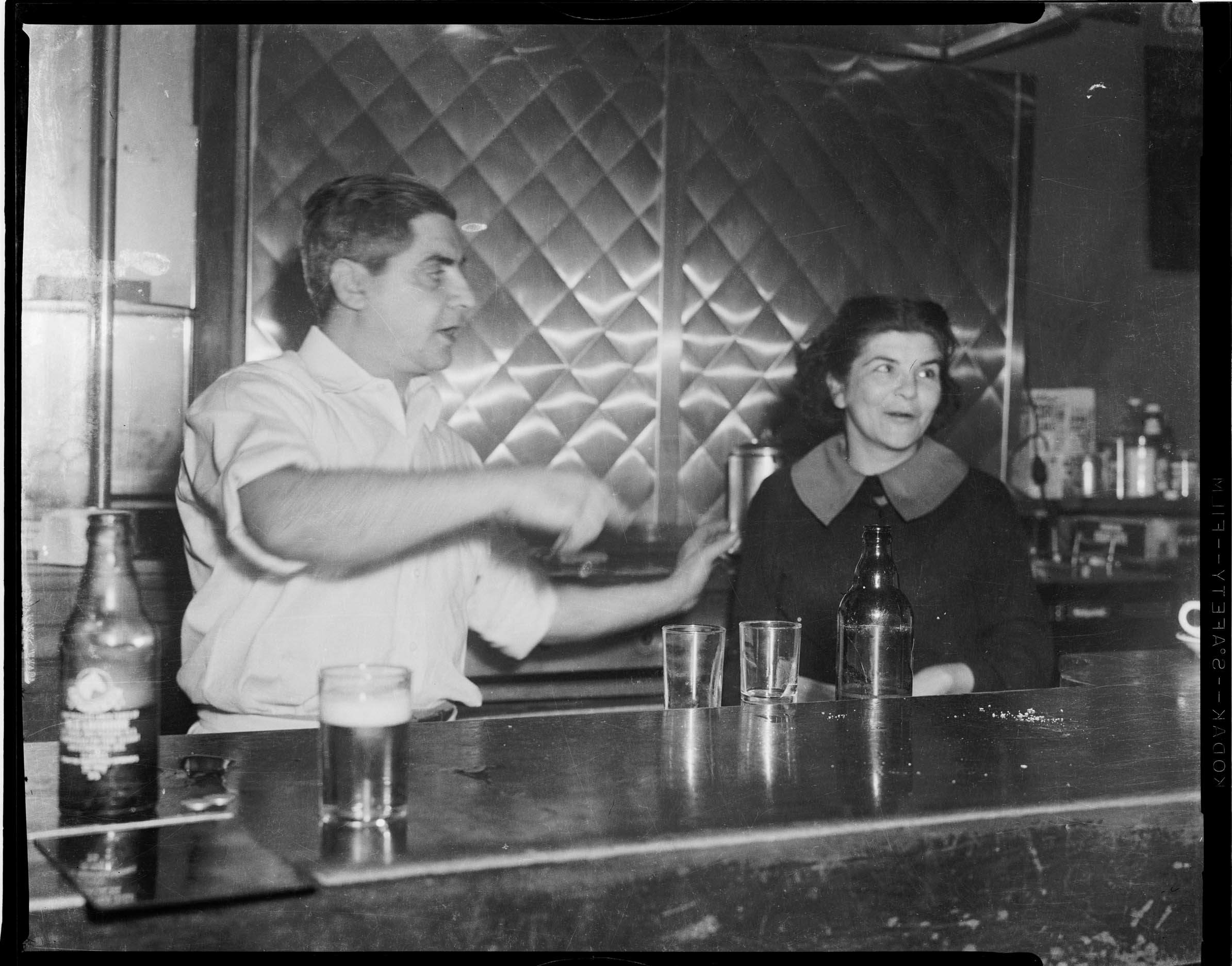 Man And Woman Behind Bar Man Gesturing To Woman Cmoa Collection