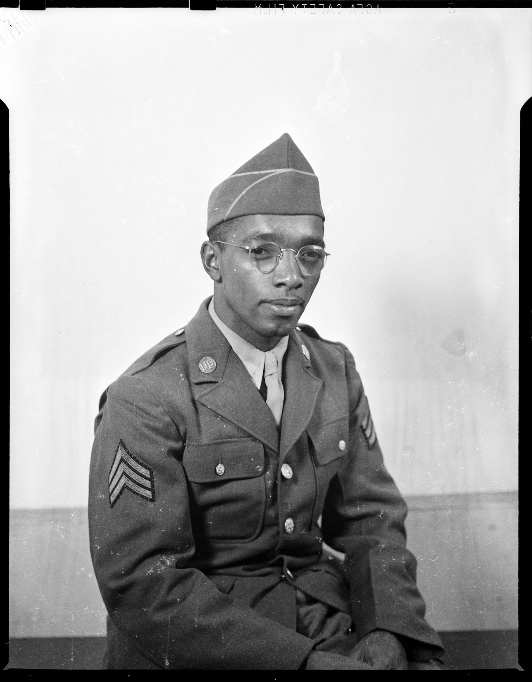 Portrait of man wearing faint moustache, eyeglasses, dark U. S. Army ...